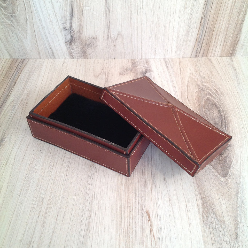 Hand made, hand stitched leather tube with 6 dice and a cool little fly ...